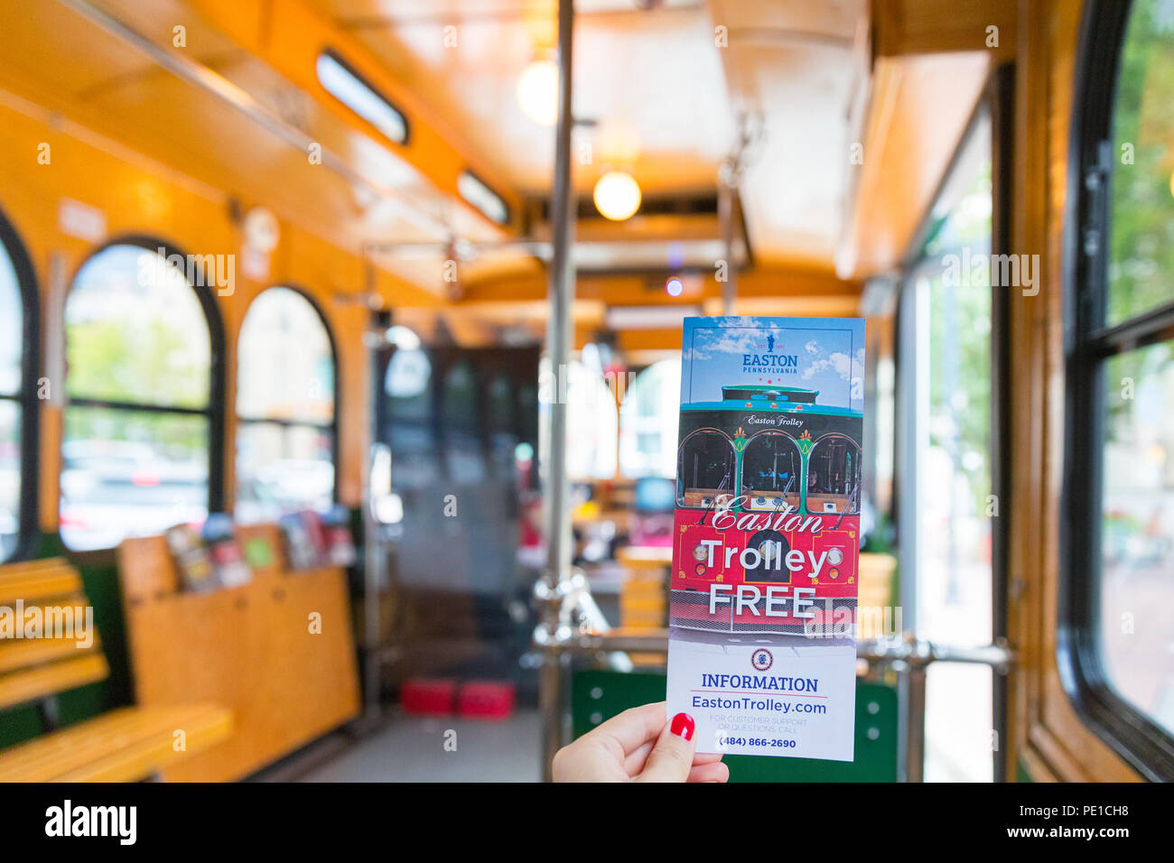 EASTON, PA - August 11, 2018: red trolley on the bus stop in EASTON ...