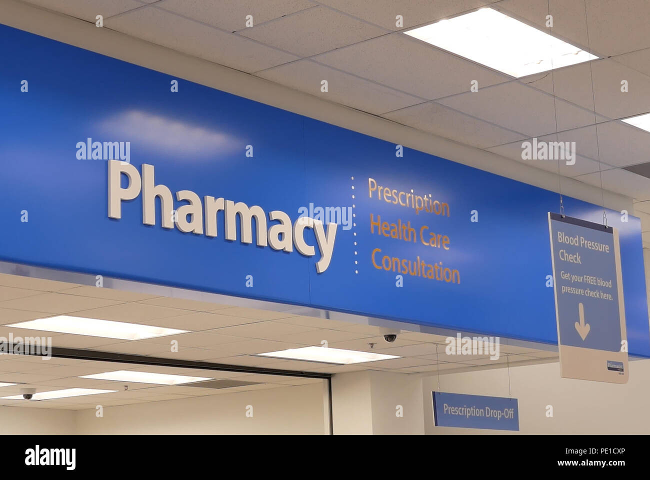 Close up of pharmacy sign hanging on store Stock Photo - Alamy