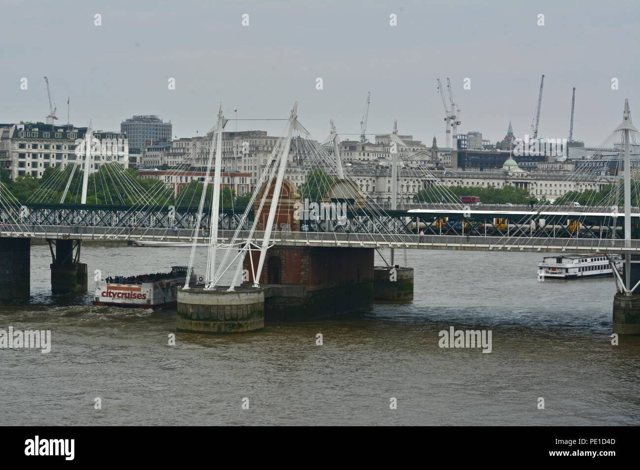 The Golden Jubilee pedestrian bridge at Embankment spanning the River ...