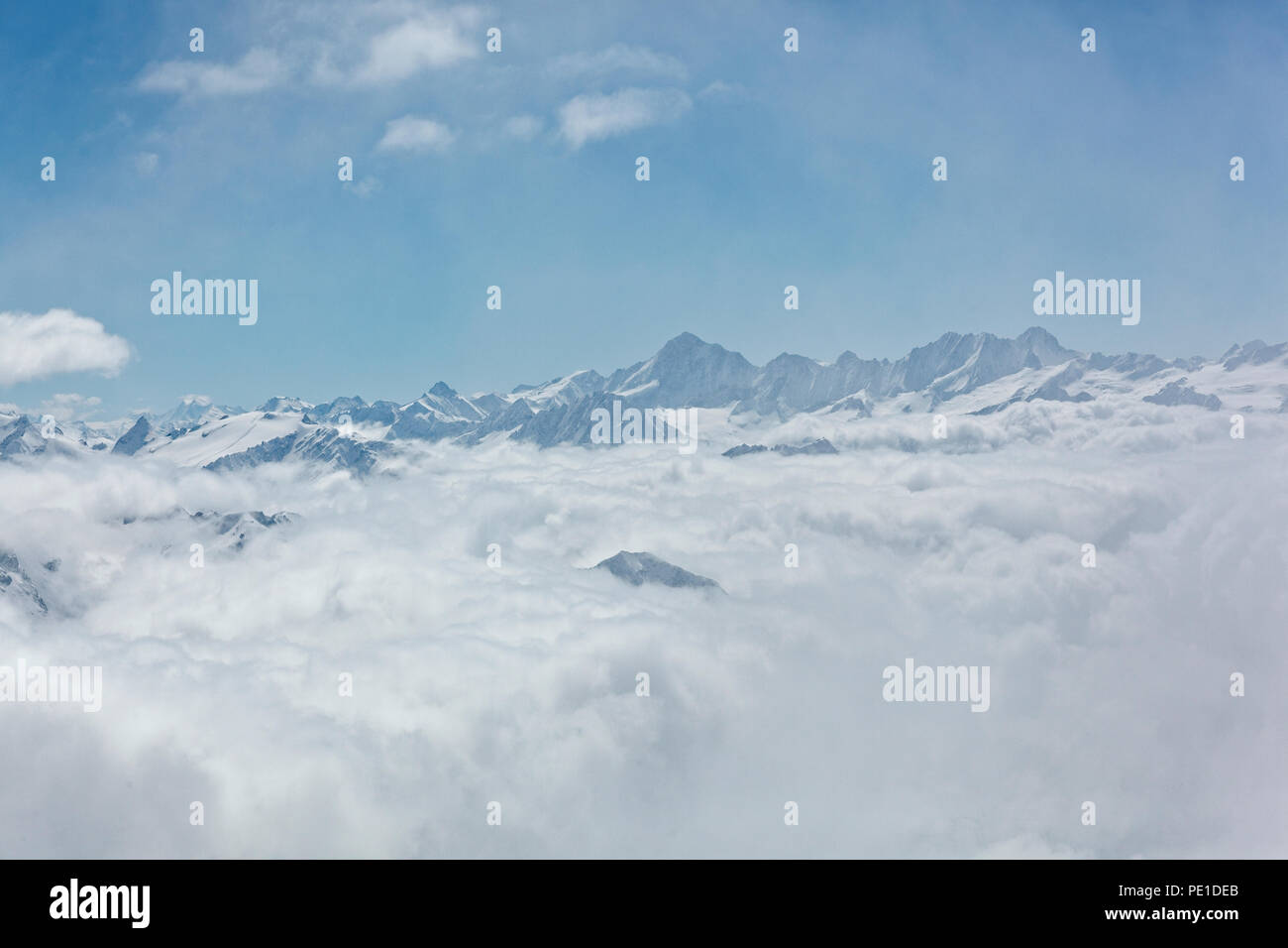 View of area surrounding the mount Titlis, in foggy misty weather ...