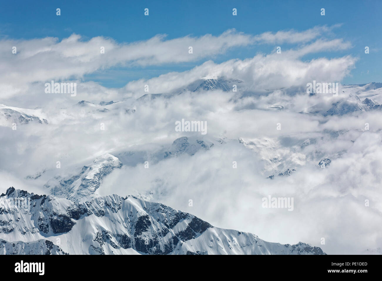 View of area surrounding the mount Titlis, in foggy misty weather ...