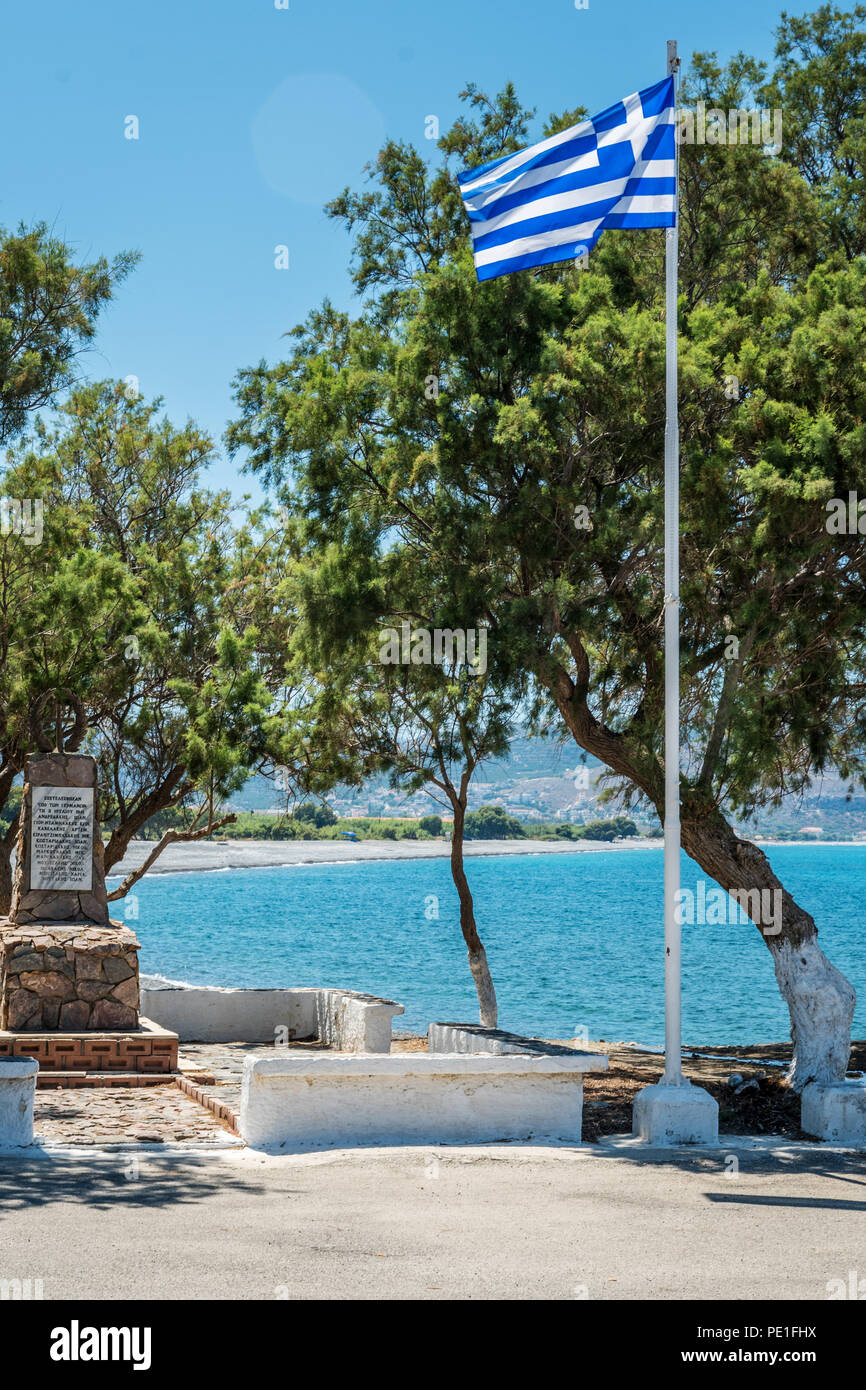 Flag of the crete in sunny day near ocean beach Stock Photo - Alamy