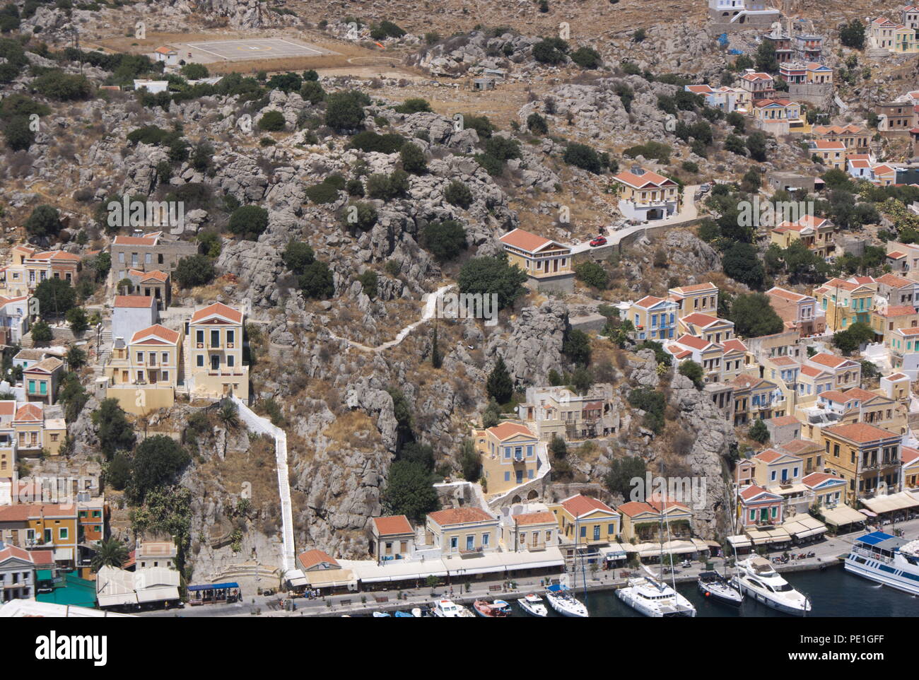 View of the houses of the port of beautiful Symi island, Greece ...