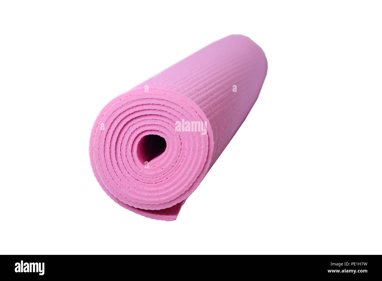 pink yoga mat on a white background ,isolated Stock Photo - Alamy