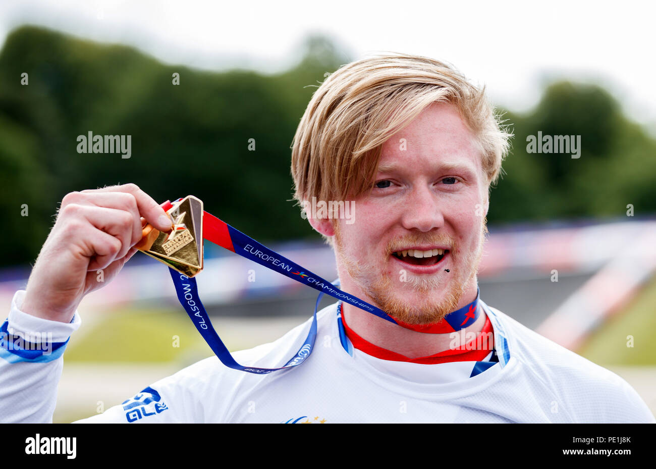 Great Britain's Kyle Evans celebrates with his gold medal after winning ...