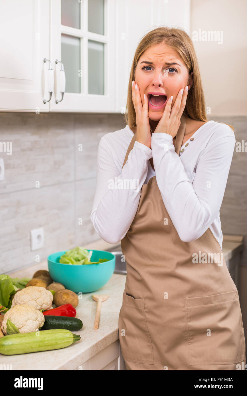 Panic woman cooking hi-res stock photography and images - Alamy