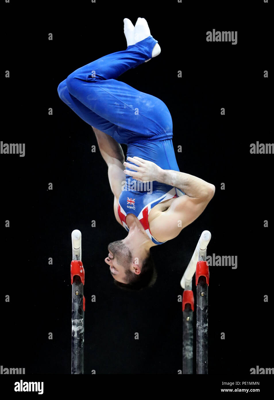 Great Britain's James Hall competes on the parallel bars in the Men's ...