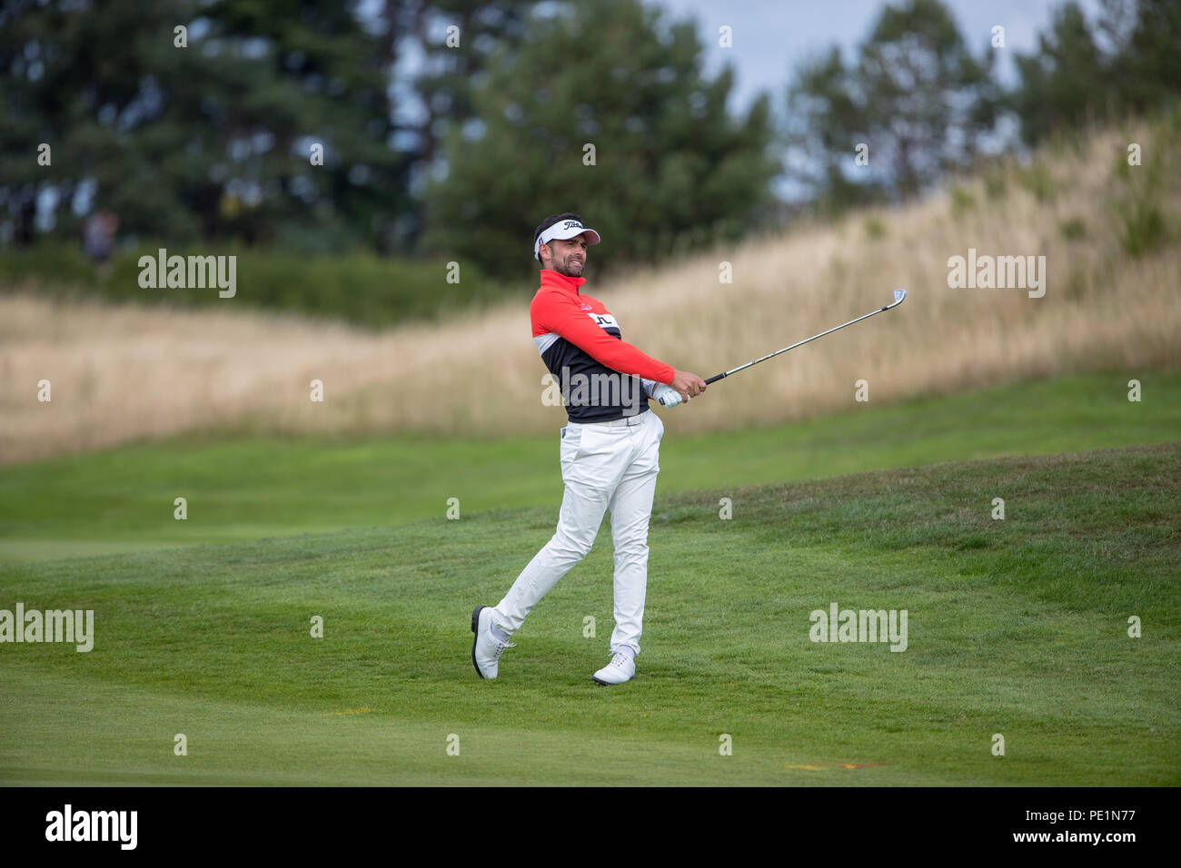 Great Britain's Lee Slattery plays his approach to the par 5 2nd hole ...