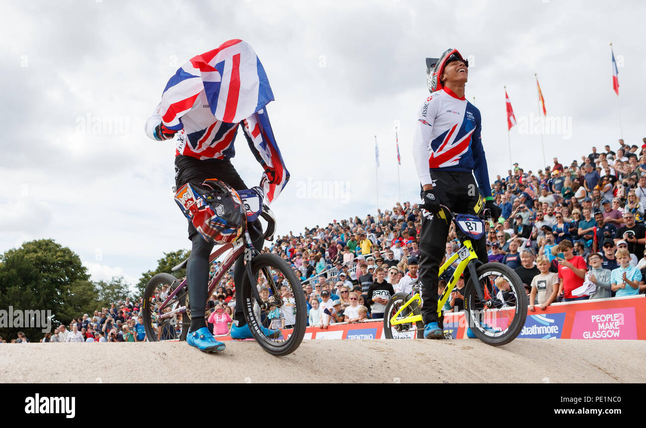 Great Britain's gold medalist Kyle Evans (left) celebrates his victory ...
