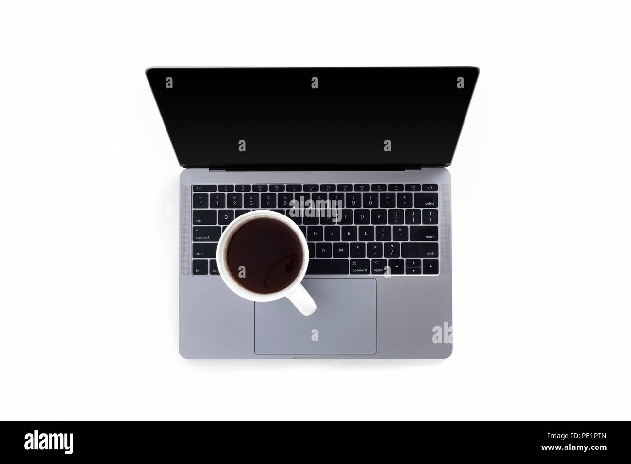 Top view of tabletop with laptop and coffee cup isolated on white ...