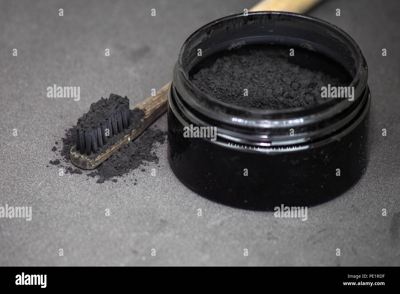 Charcoal powder teeth hi-res stock photography and images - Alamy