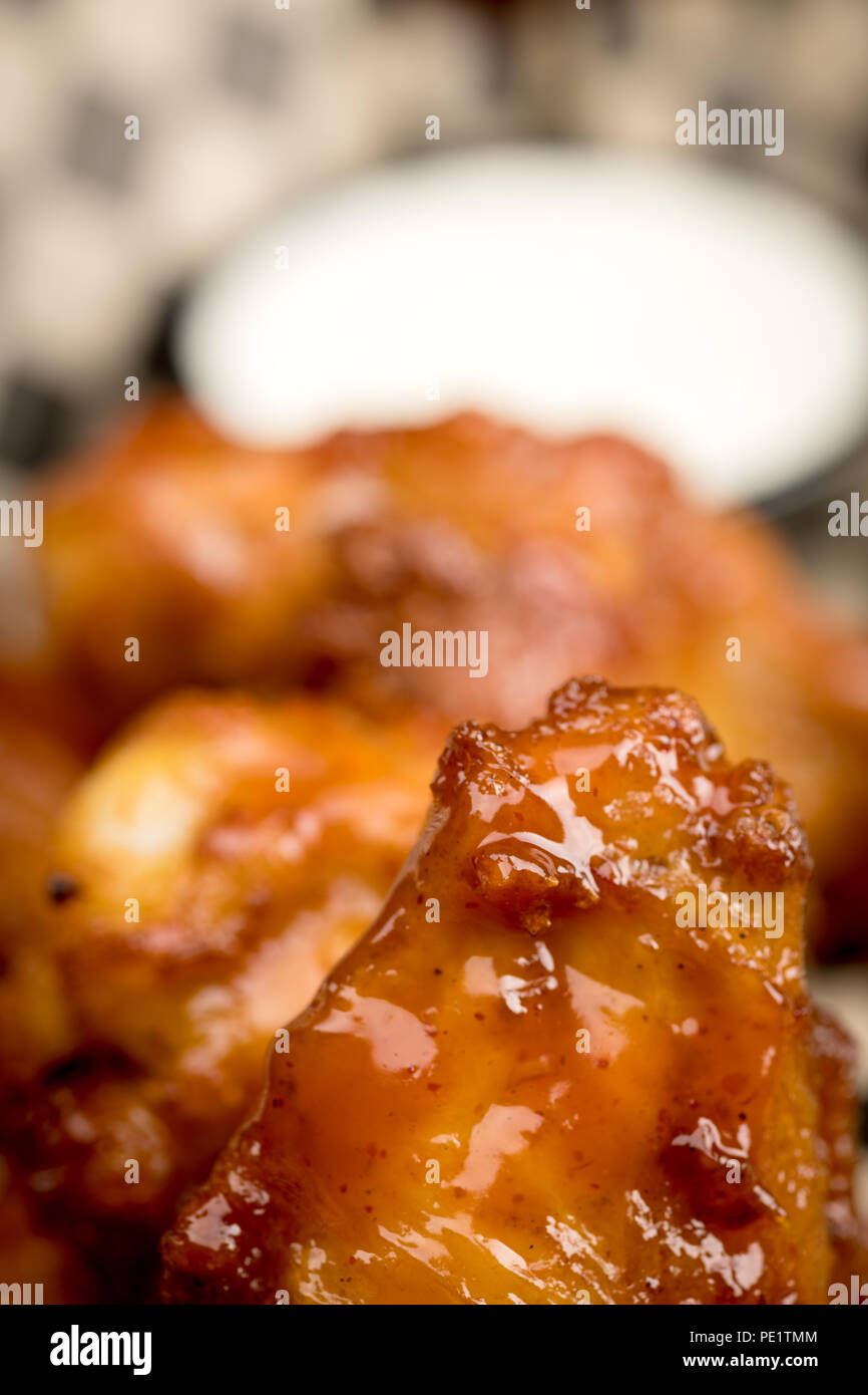 Glazed Chicken Wing close up that is glistening Stock Photo - Alamy
