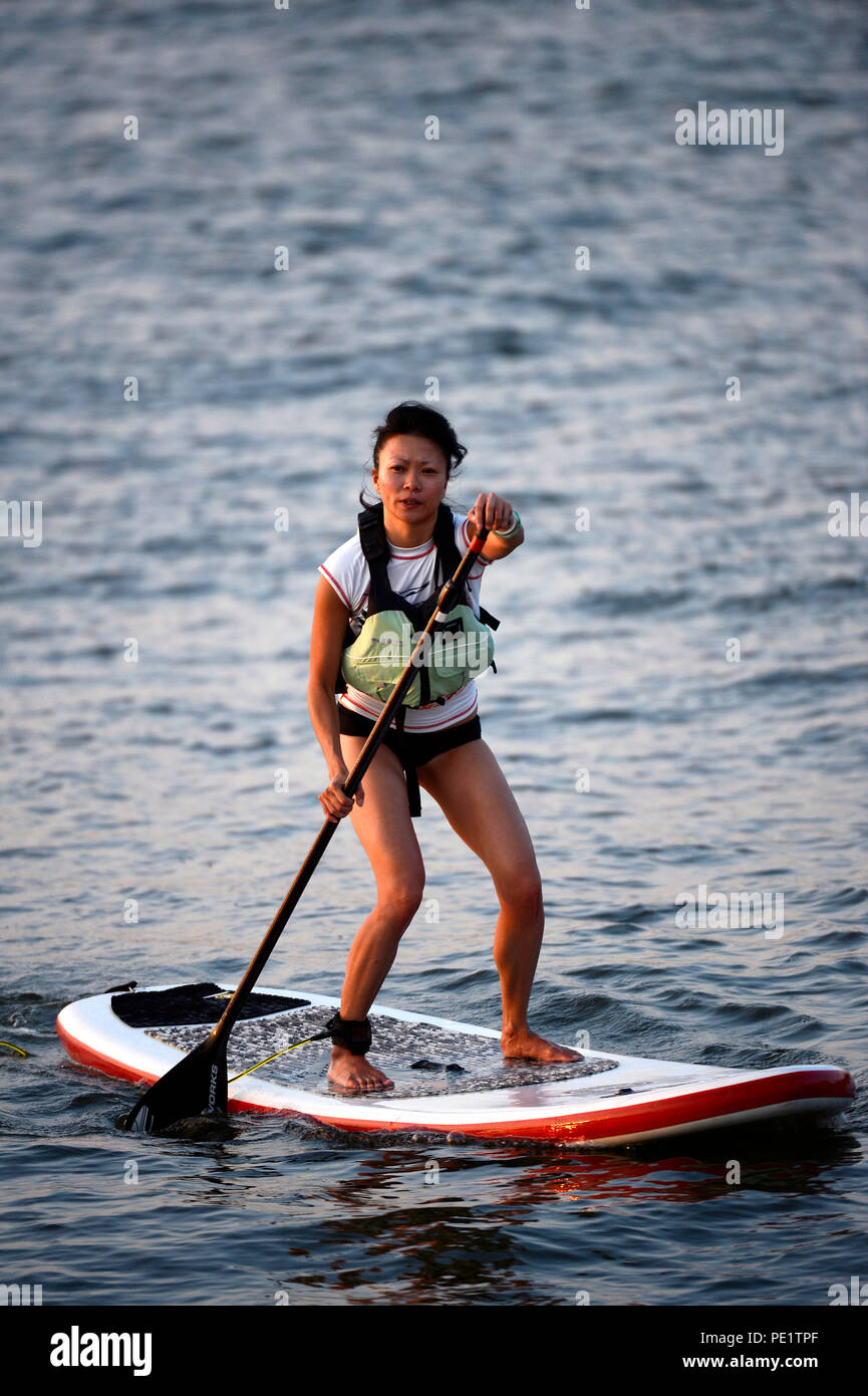 Asian woman paddleboard hi-res stock photography and images - Alamy