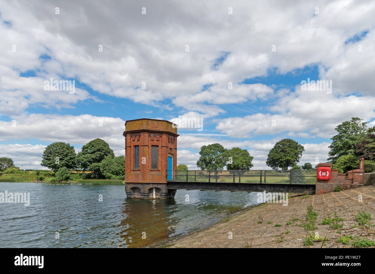 Brick built Edwardian water or valve tower on the shore of Sywell ...