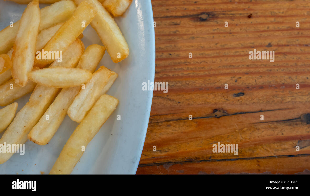 Top Angle View of Home Made French Fries on White Plate Stock Photo - Alamy