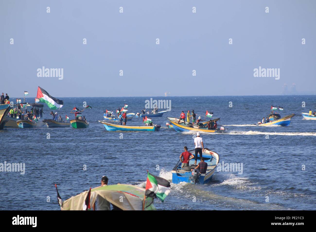Gaza City, The Gaza Strip, Palestine. 11th Aug, 2018. Palestinians ride ...