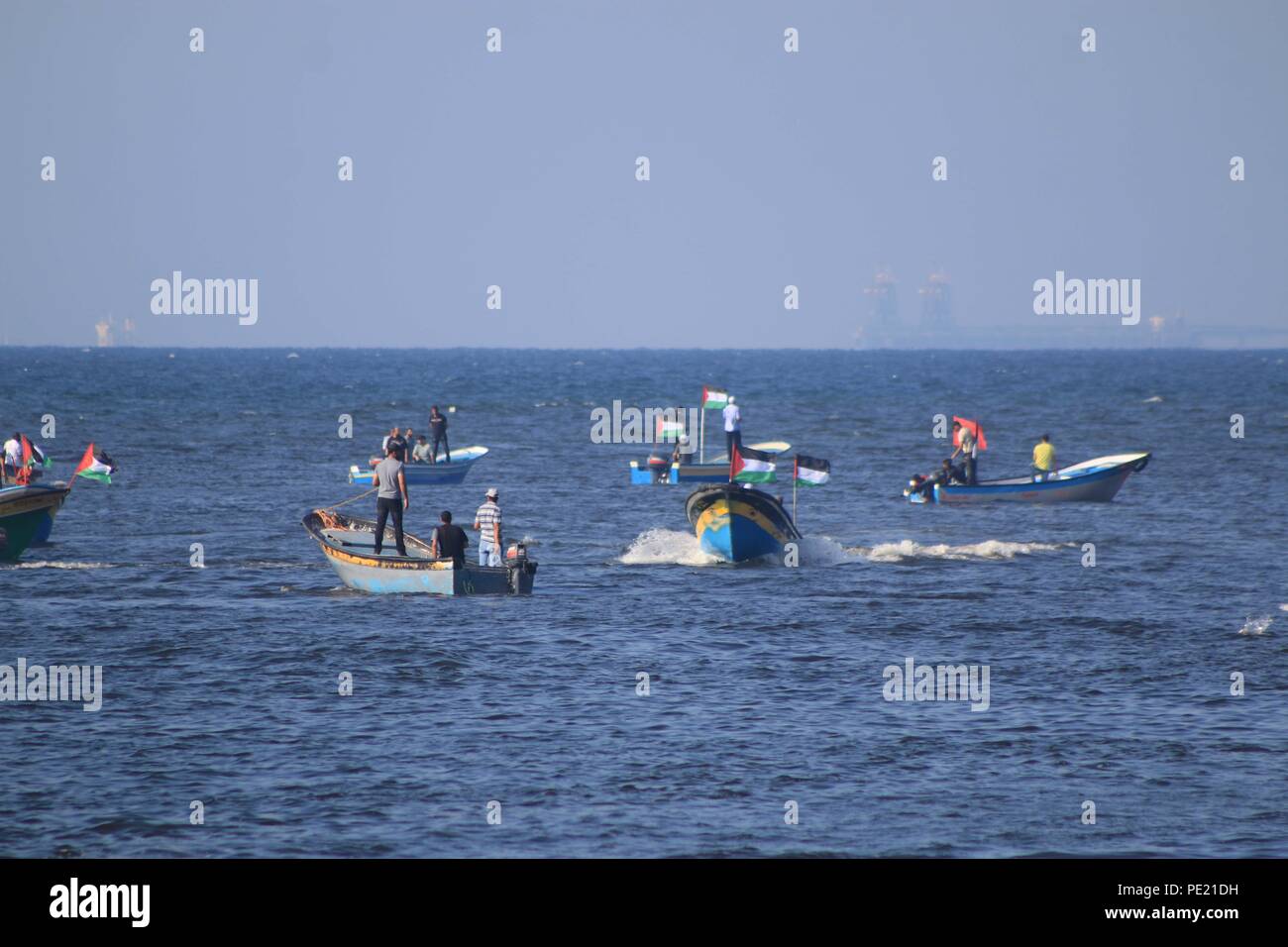 Gaza City, The Gaza Strip, Palestine. 11th Aug, 2018. Palestinians ride ...