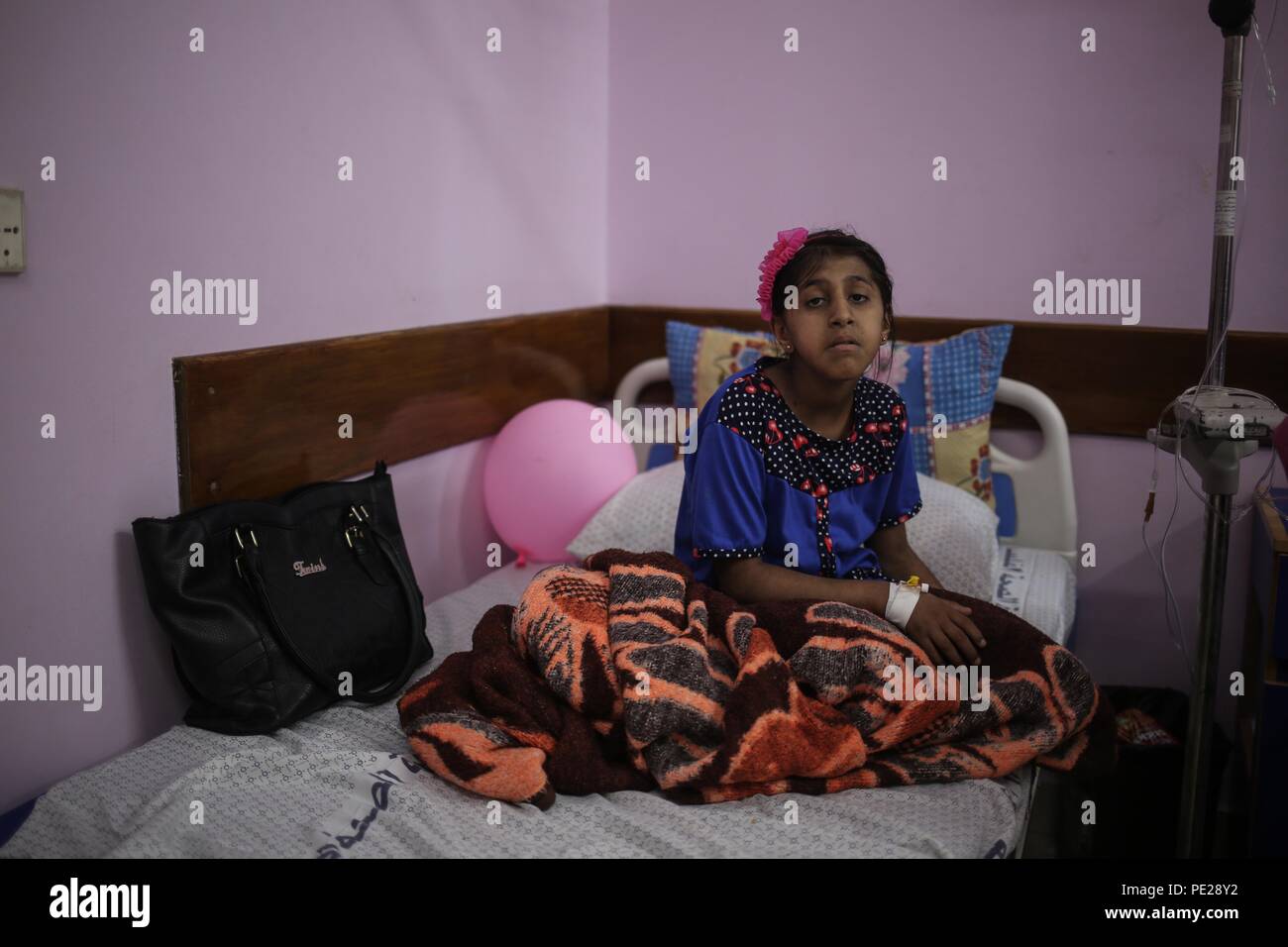 Gaza City, The Gaza Strip, Palestine. 12th Aug, 2018. A Palestinian ...