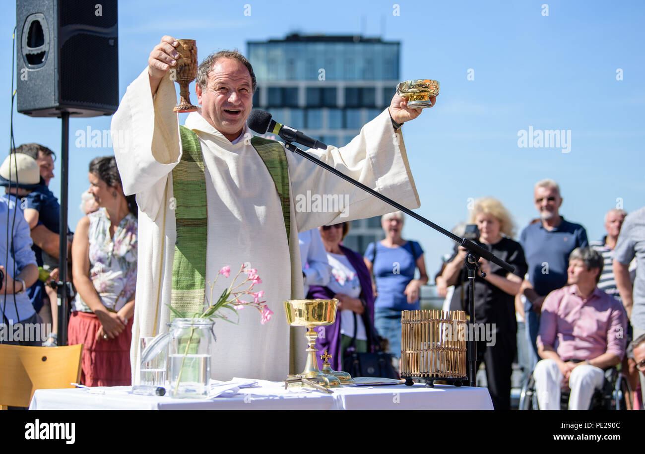 Munich, Germany. 12th Aug, 2018. Father Rainer Maria Schiessler holds a ...