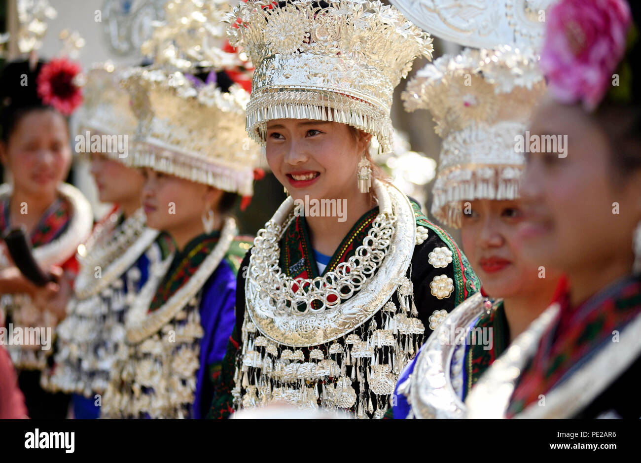 Qiandongnan, China's Guizhou Province. 12th Aug, 2018. Girls wearing ...