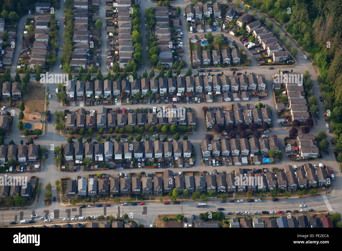 Aerial view of residential neighborhood during a sunny summer day ...