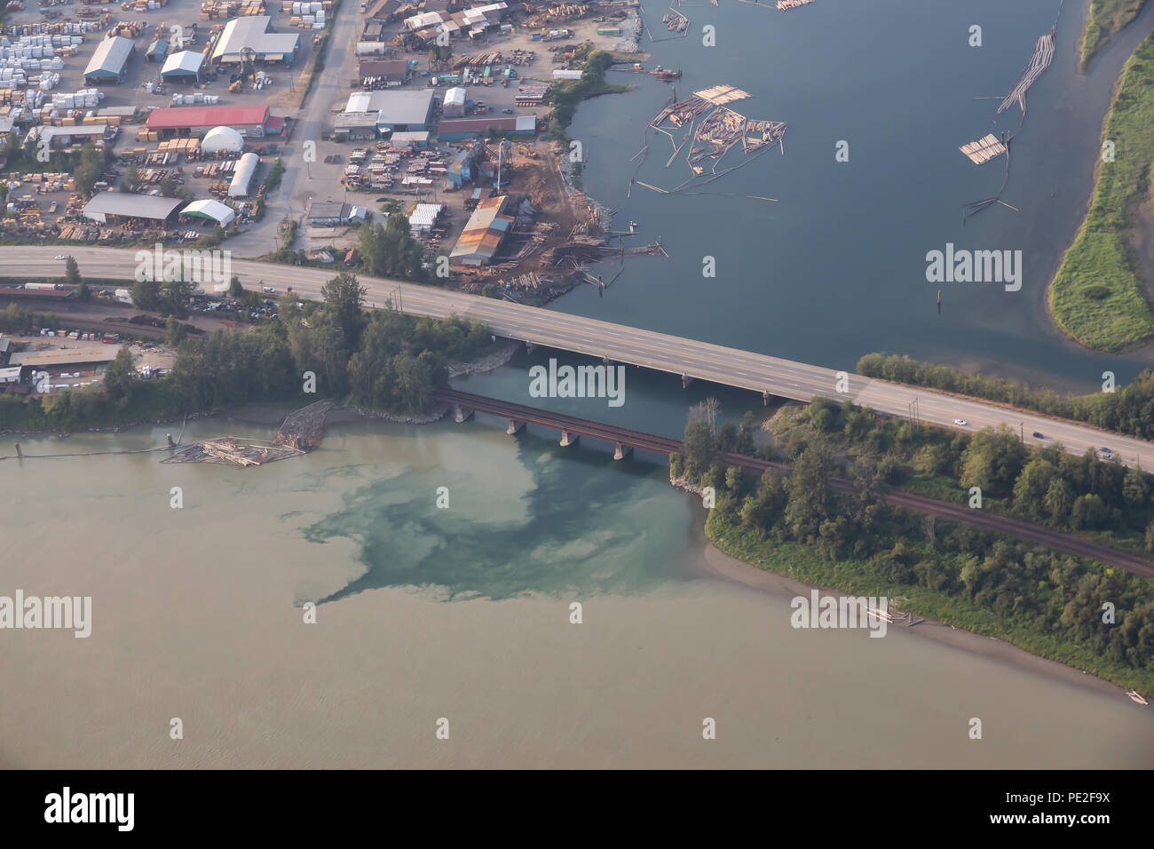 Aerial view of Rivers joining together. Located in Greater Vancouver ...