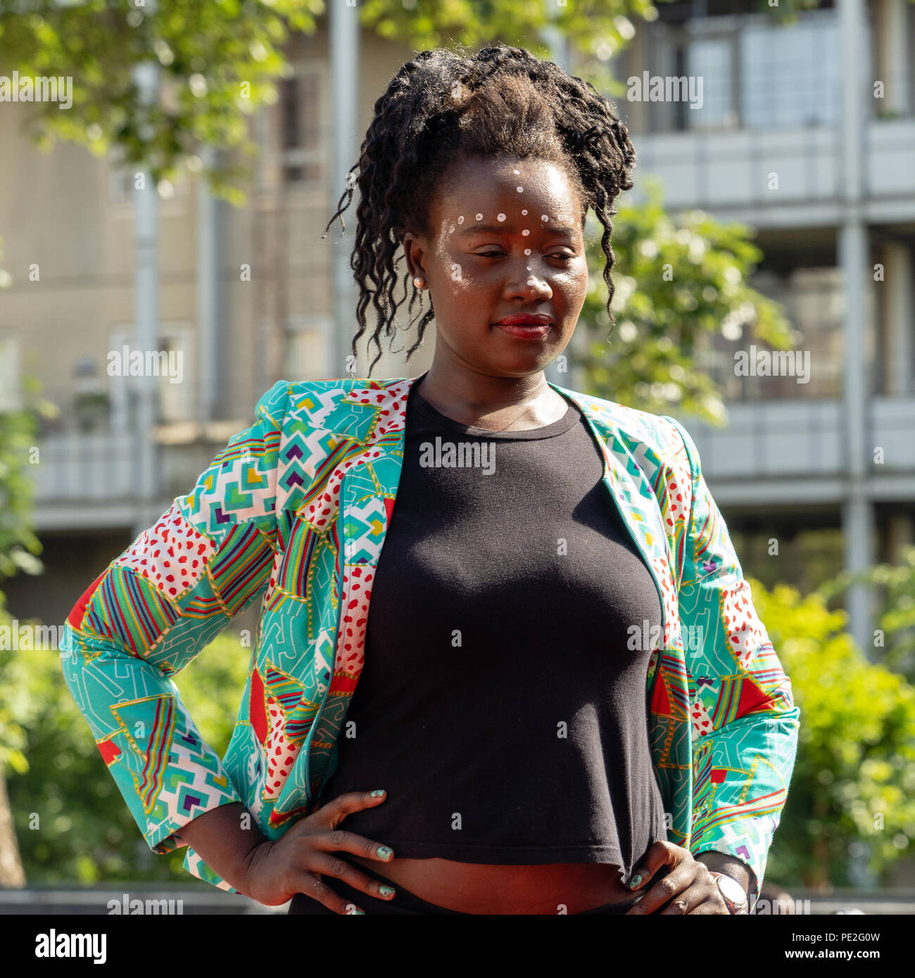 Female model of African origin showing African fashion on the catwalk ...