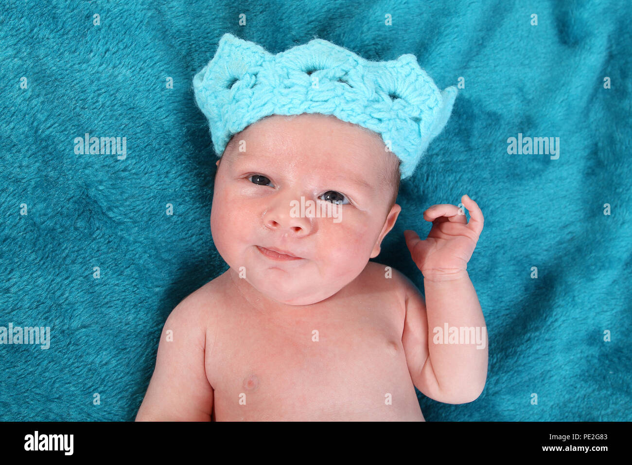 Baby boy in blue hi-res stock photography and images - Alamy
