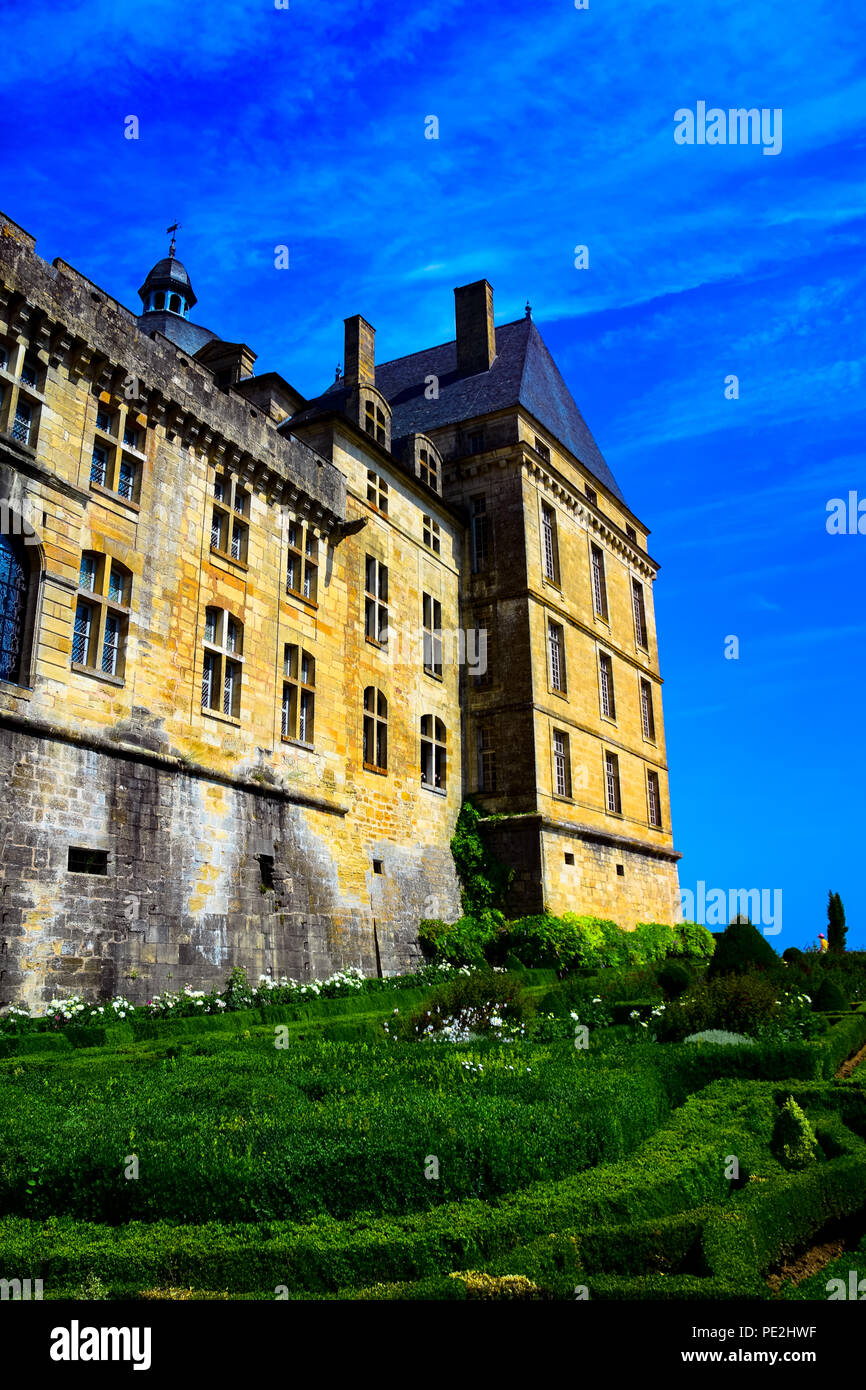 The architecture and grounds of the majestic Chateau de Hautefort in ...