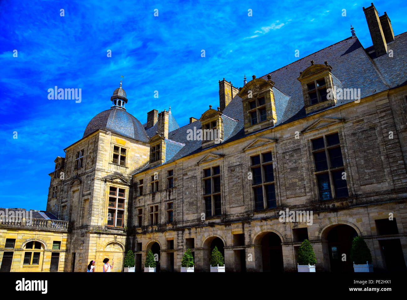 The architecture and grounds of the majestic Chateau de Hautefort in ...