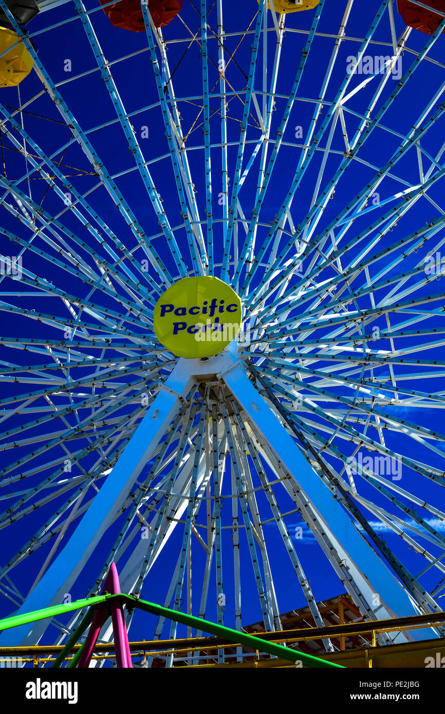 Ferris wheel and rides in the Pacific Park amusement park on Santa ...