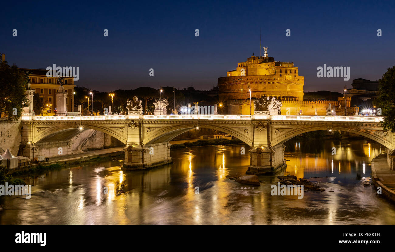 Bridge over Tiber river at night. In background Saint Angel Castle Stock Photo - Alamy
