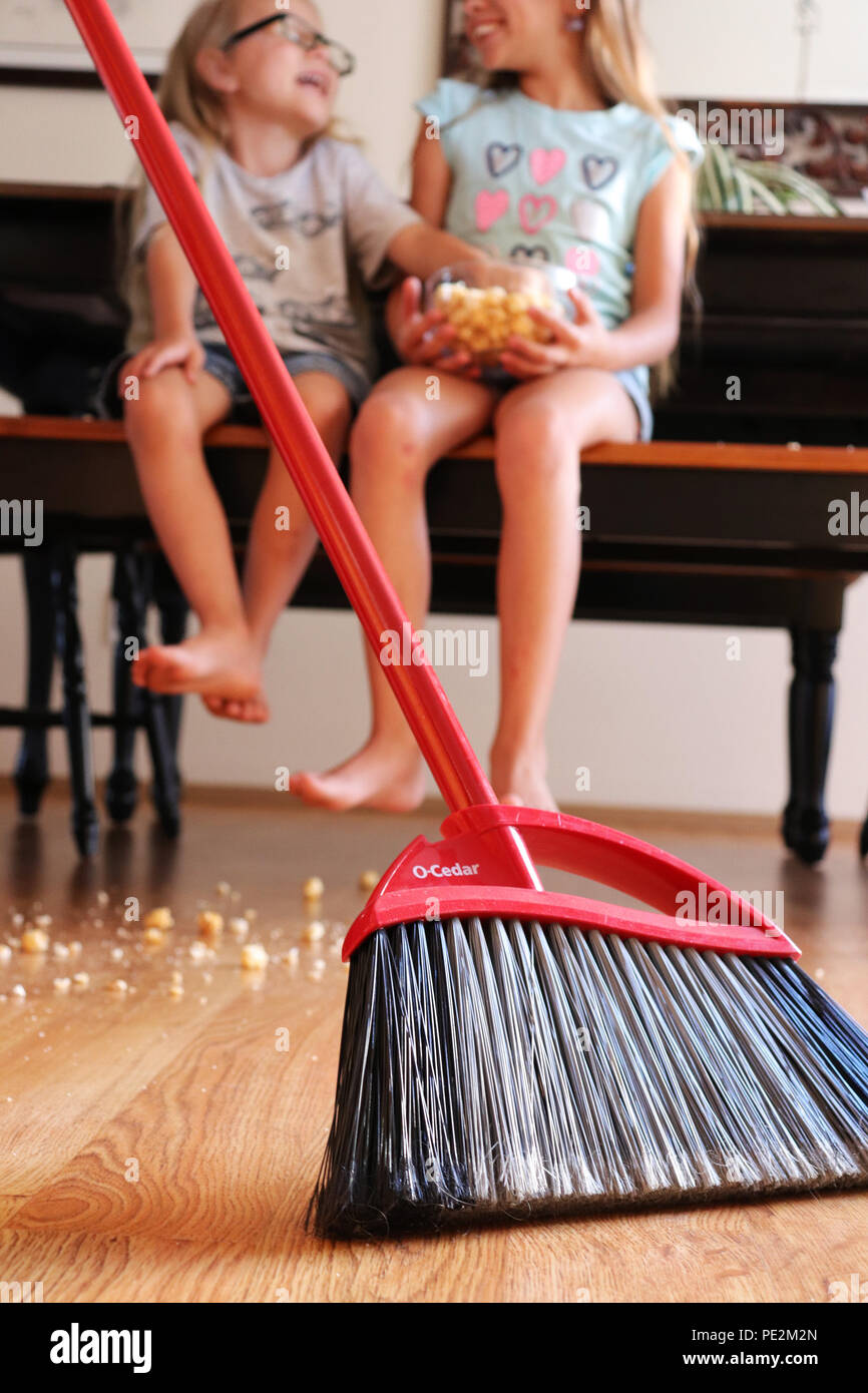 Cleaning the house with O-Cedar Broom Stock Photo - Alamy