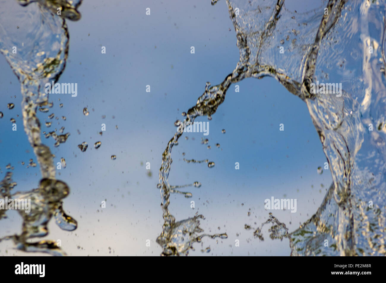 transparent falling water vertical flows, close up Stock Photo - Alamy