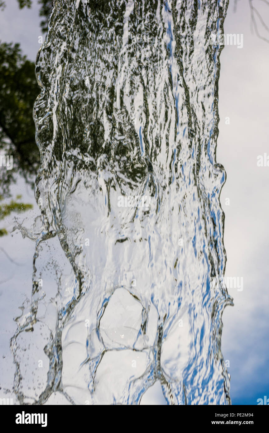 transparent falling water vertical flows, close up Stock Photo - Alamy
