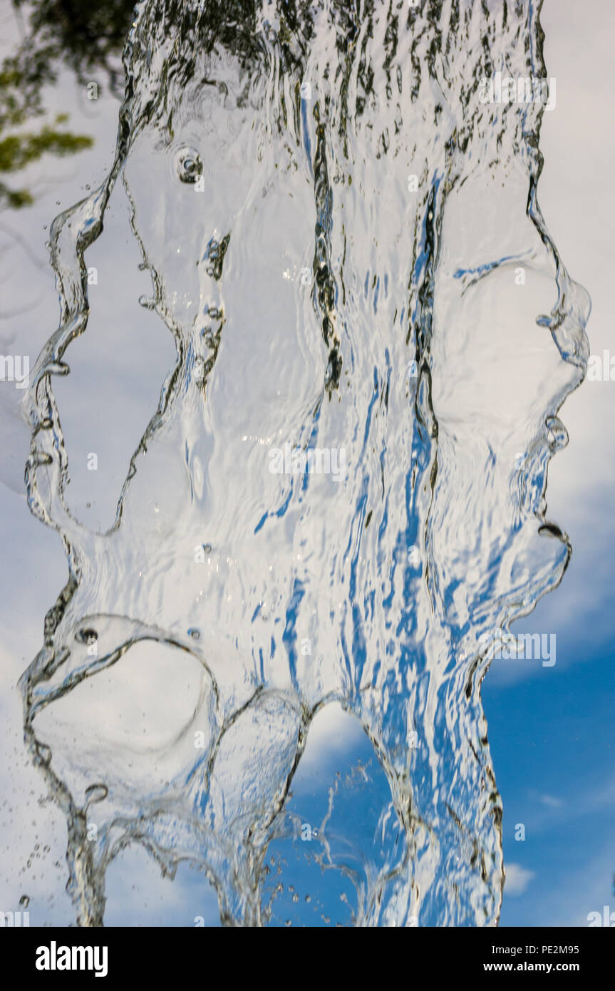 transparent falling water vertical flows, close up Stock Photo - Alamy