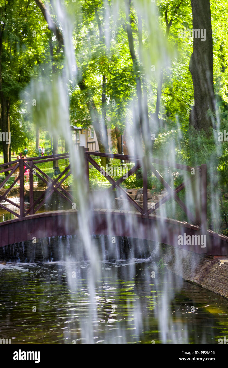 transparent falling water vertical flows, close up Stock Photo - Alamy