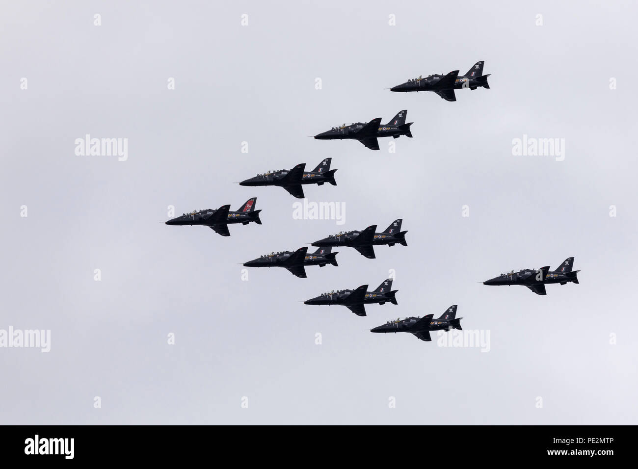 Nine Royal Air Force BAE Systems Hawk T aircraft flying in formation ...