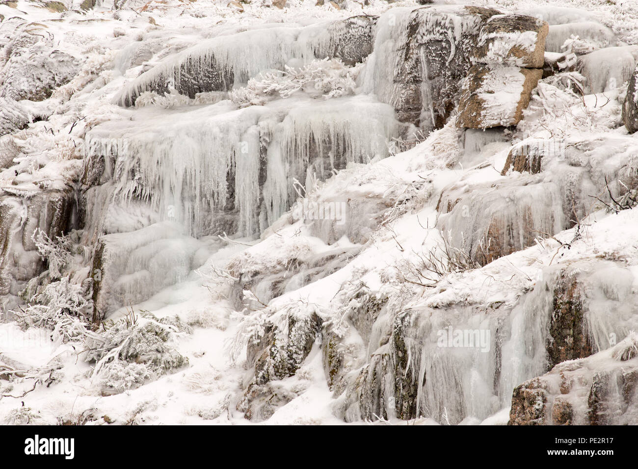 ice and icicles below the dam at Covao do Curral Stock Photo - Alamy