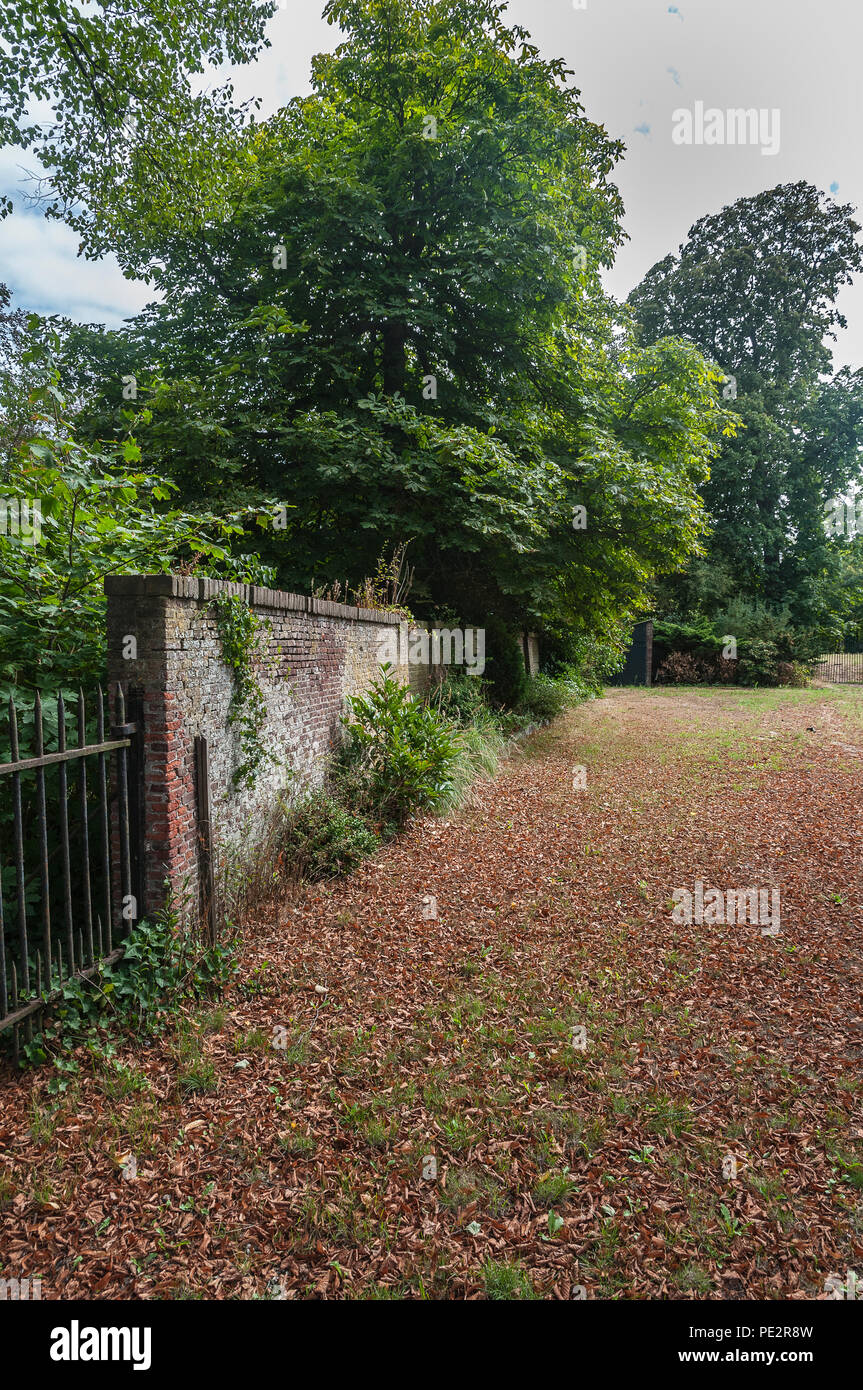 old Dutch wall with a fence situated in nature Stock Photo - Alamy