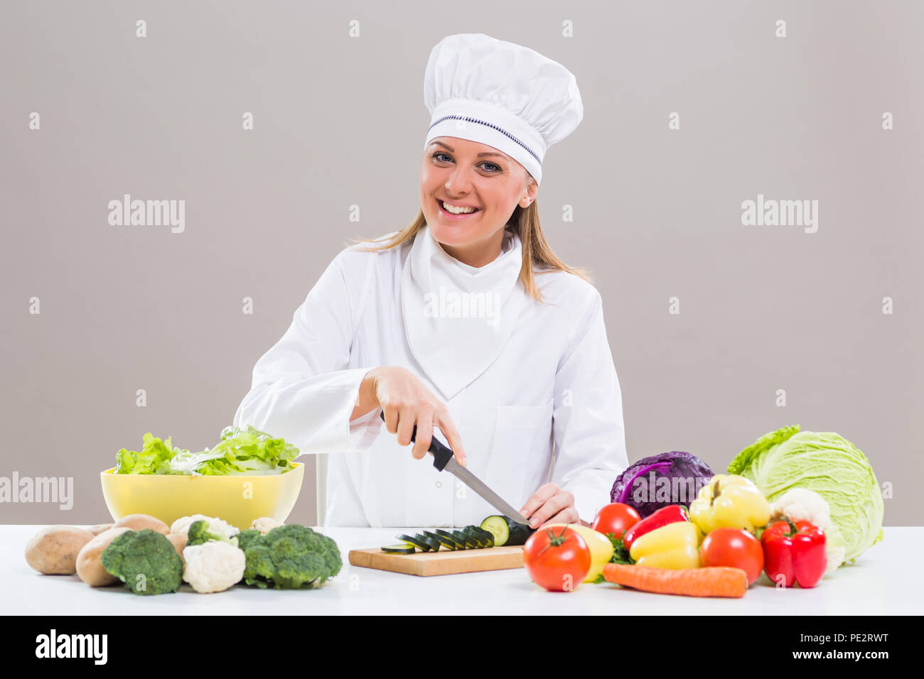 Female chef making healthy meal Stock Photo - Alamy