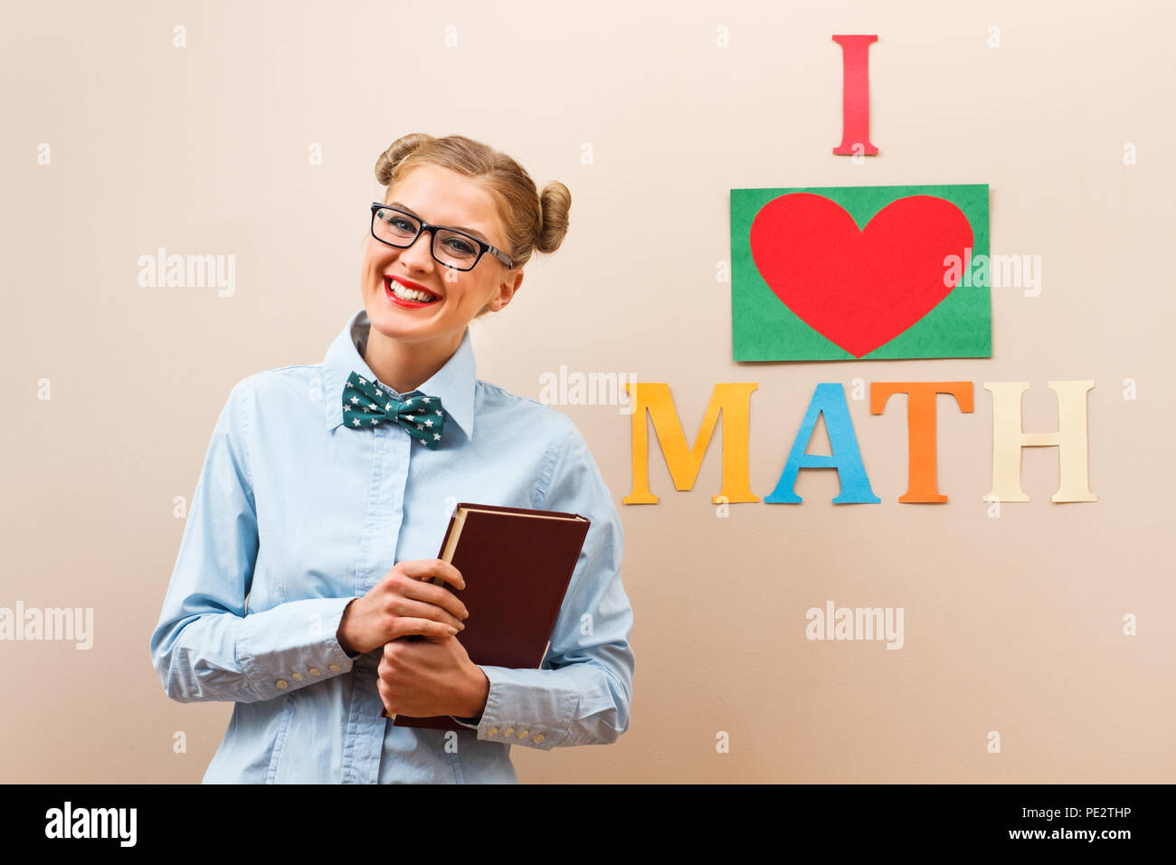 Portrait of nerdy student who loves math Stock Photo - Alamy