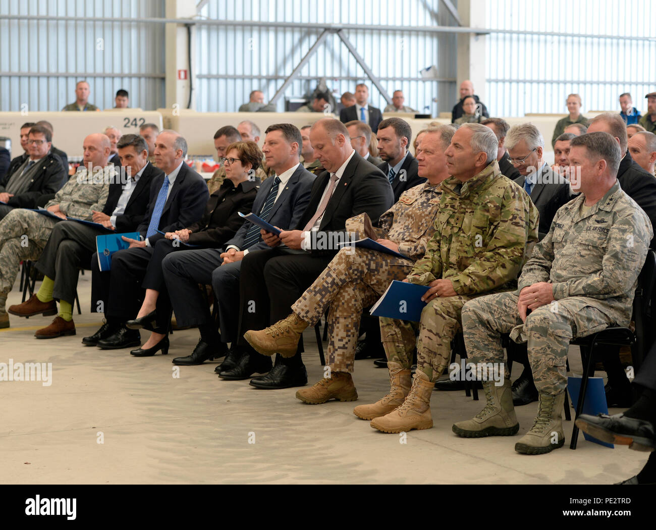 Guests listen to speakers during a distinguished visitor and media day ...