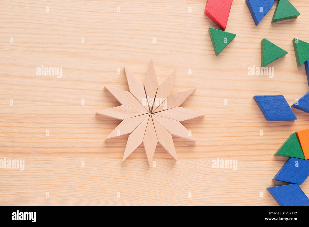 Children's game with colored wooden blocks. Draw a Pattern Stock Photo ...