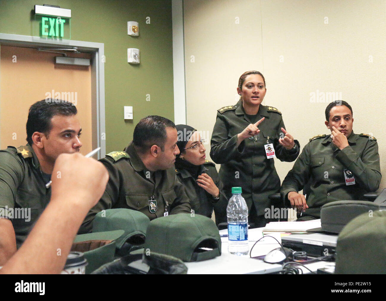 An Egyptian Armed Forces female officer leads the discussion within her ...