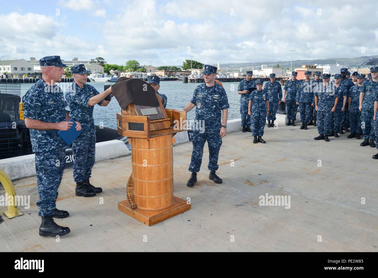 Admiral Scott Swift, commander of U.S. Pacific Fleet, watches as USS ...