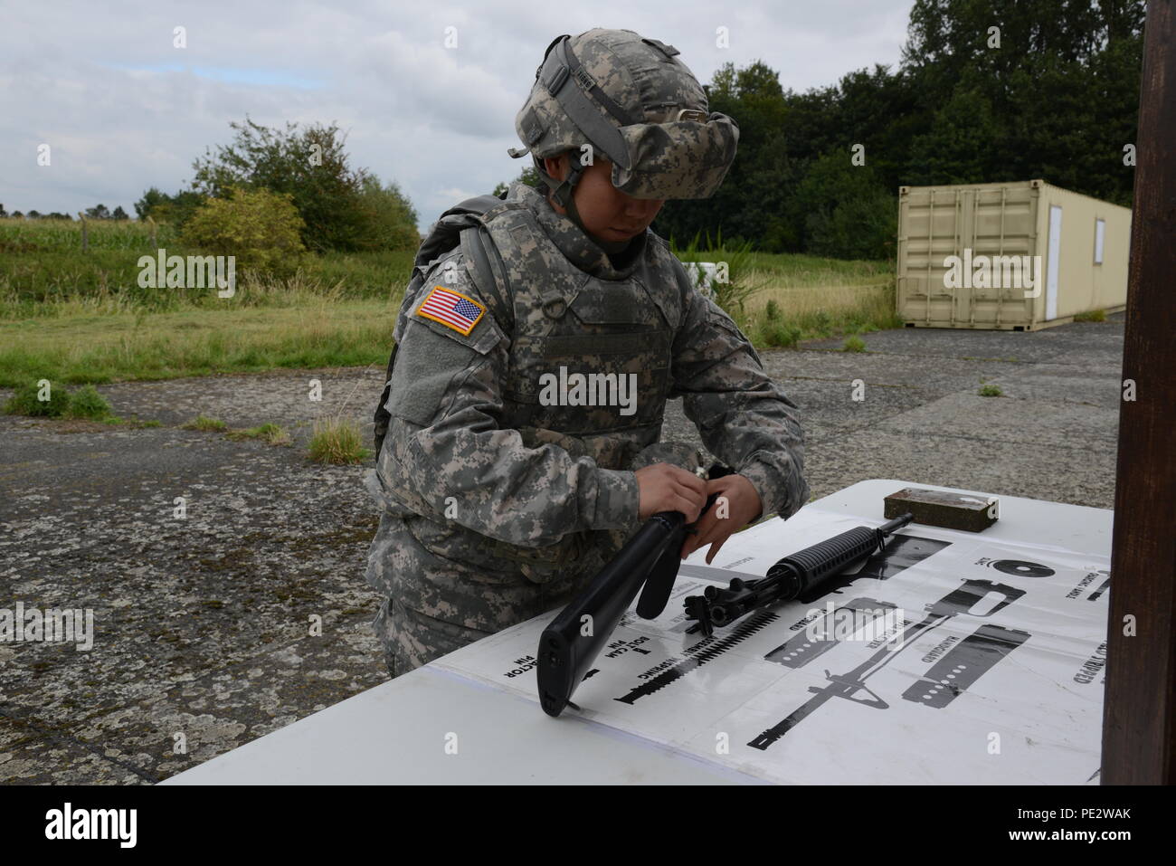U.S. Army Sgt. Kia Xiong, 2nd Signal Brigade, Wiesbaden perform M16 A2 ...