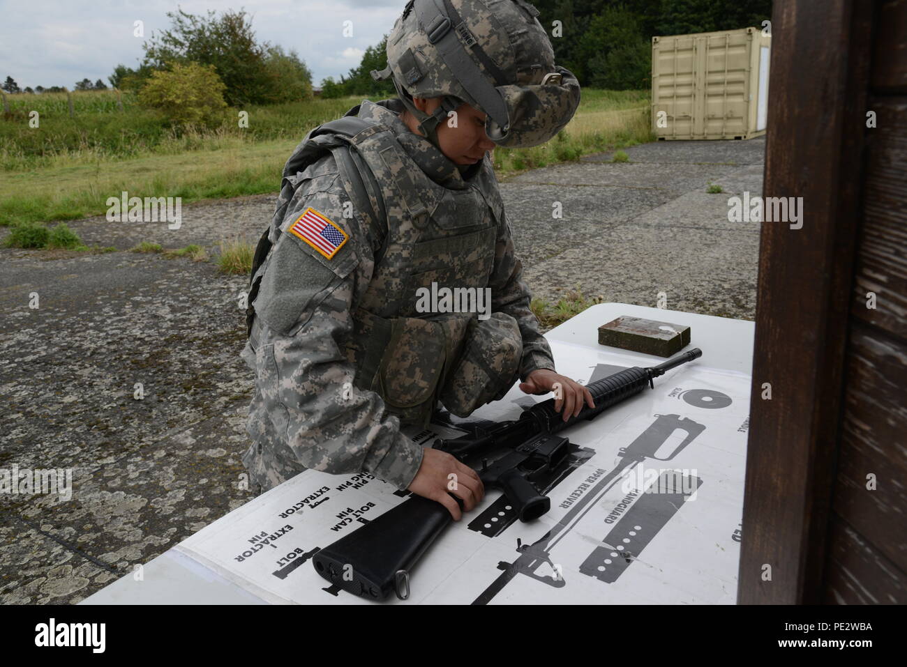 U.S. Army Sgt. Kia Xiong, 2nd Signal Brigade, Wiesbaden perform M16 A2 ...