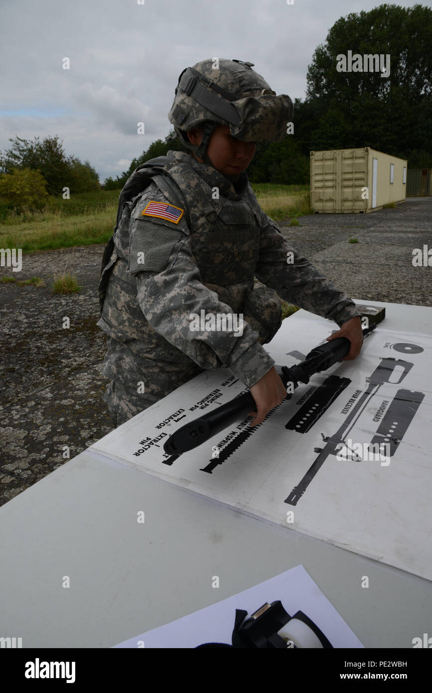U.S. Army Sgt. Kia Xiong, 2nd Signal Brigade, Wiesbaden perform M16 A2 ...