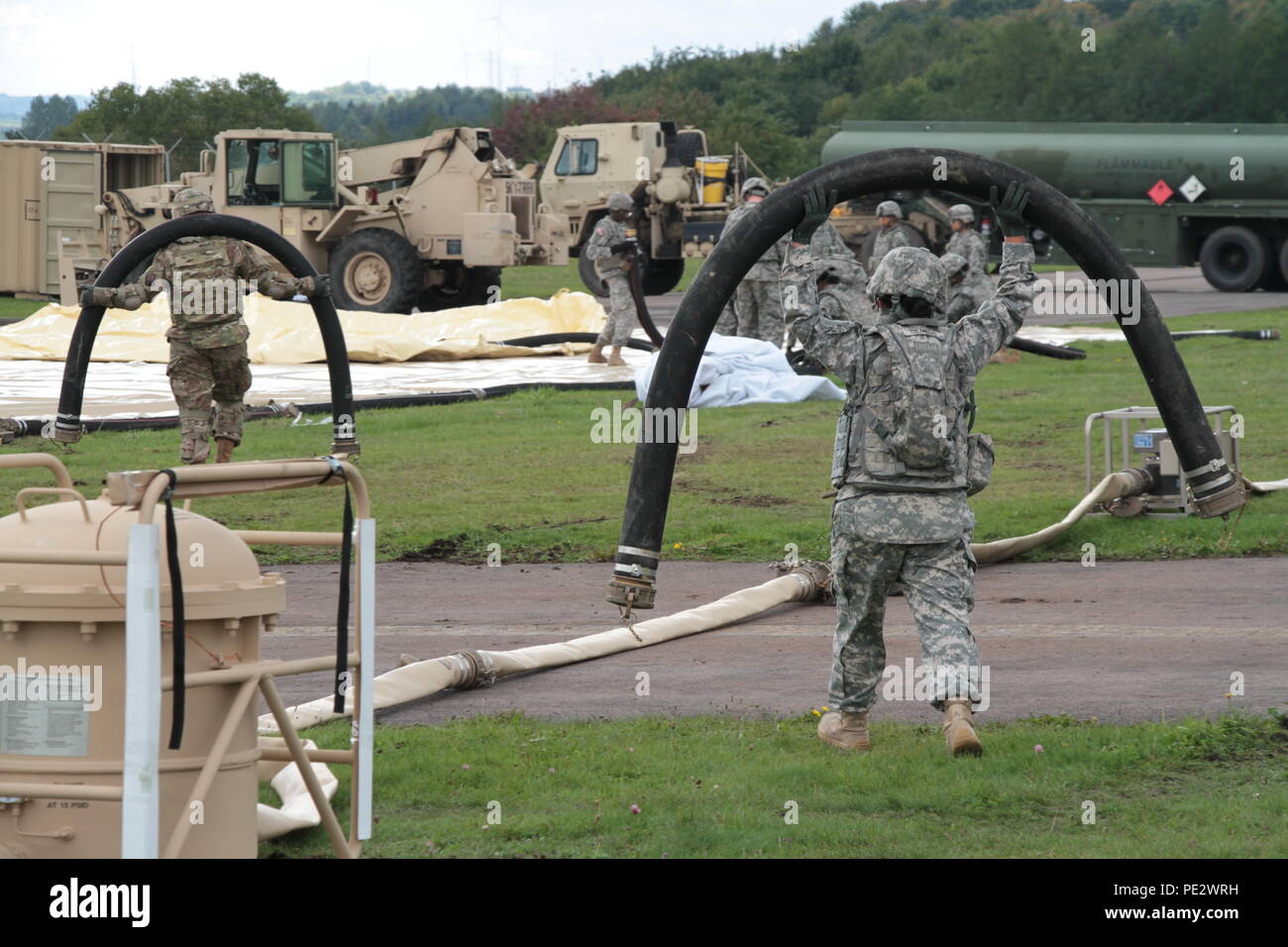 Soldiers from 18th Combat Sustainment Support Battalion carry set up a ...